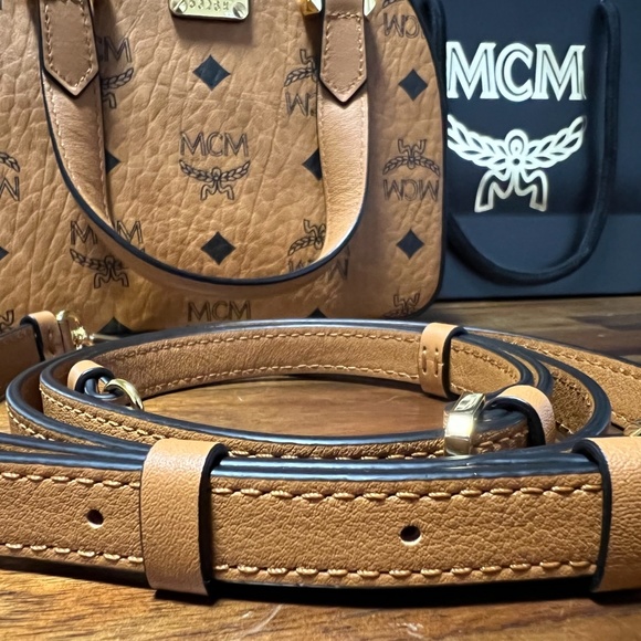 MCM | Bags | Rare Mcm Signature Cognac Diamond Logo Leather Mini Round ...